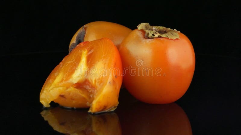 Red ripe persimmons stock image. Image of healthy, asian - 297877349