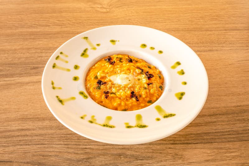 Red Risotto, Color Contributed by Tomato, with Pine Nuts, Cheese Stock ...