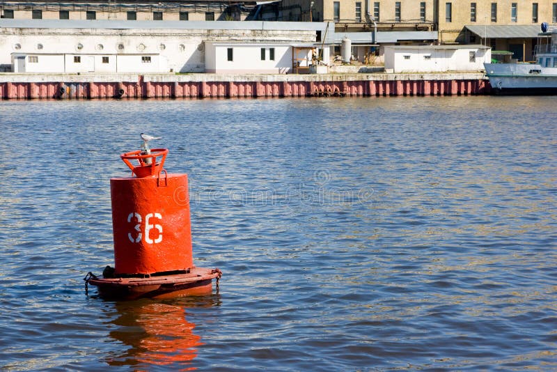 Red river buoy floating stock image. Image of industry - 40199399