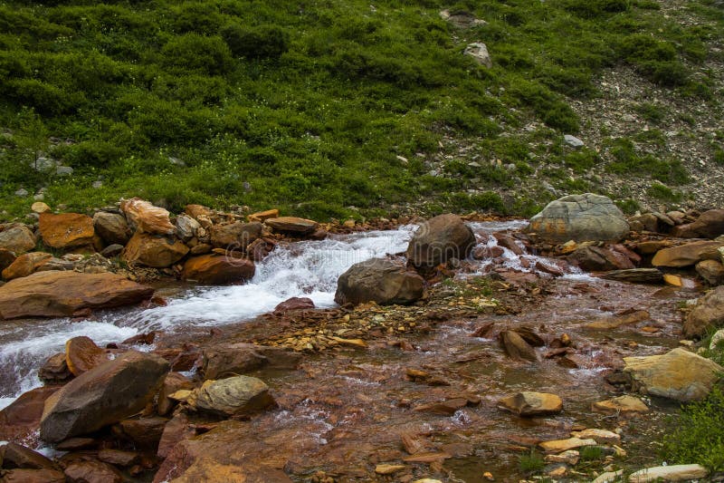 Red river rocks and water stock photo. Image of green - 323425786