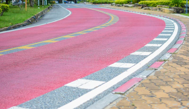 Red Road for Clear Visibility Stock Photo - Image of feet, asphalt ...