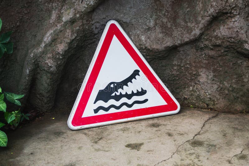 Red Road Sign Beware of Crocodiles. Attention Crocodiles Stock Image ...