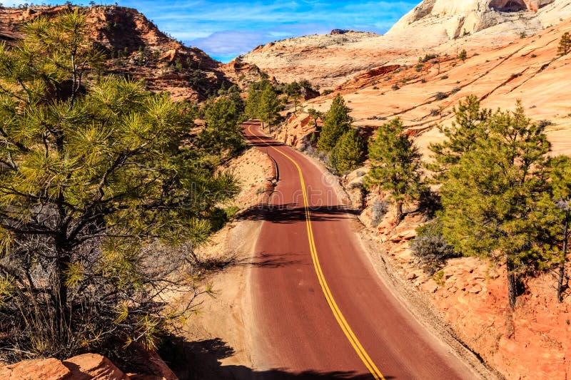 A Red Road with Trees on the Side Stock Photo - Image of scenery ...