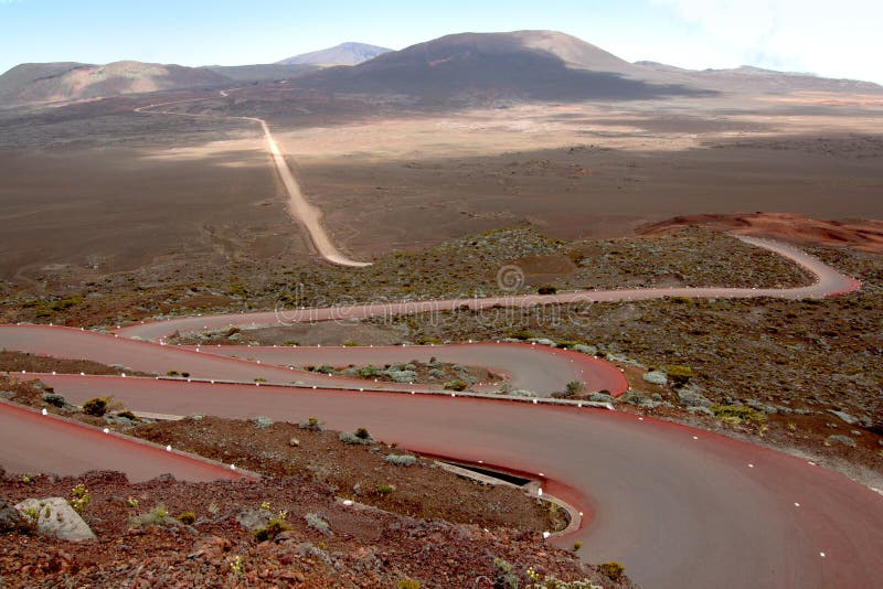 Red road winding its way stock photo. Image of flow, crossing - 7750904