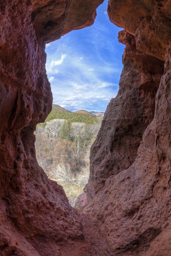 Red Rock cave stock photo. Image of green, clouds, stone - 21102592