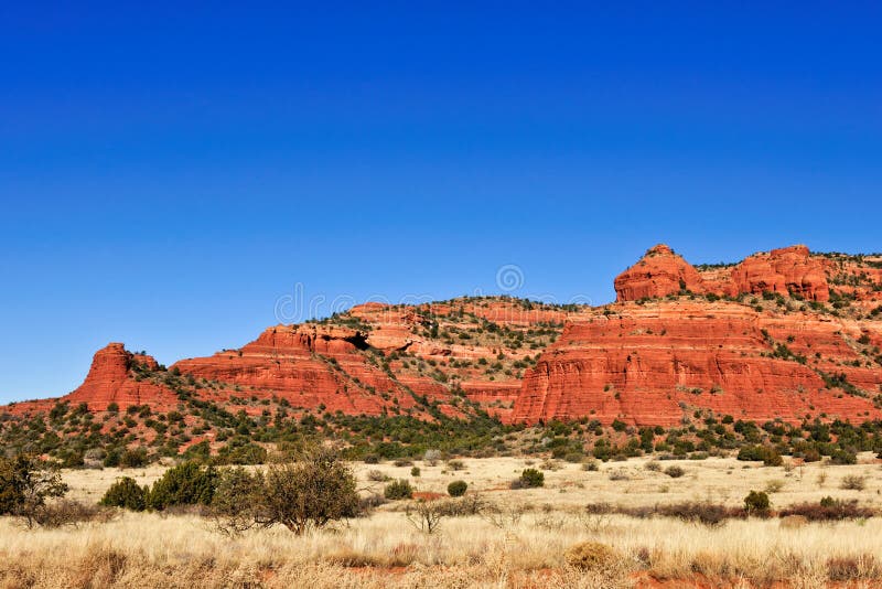 Red rock in the desert stock image. Image of bushes, desert - 8507603