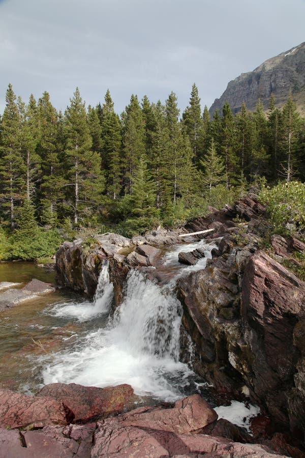 Red Rock Falls and Mountain at Sunset, Glacier N P Stock Photo - Image ...