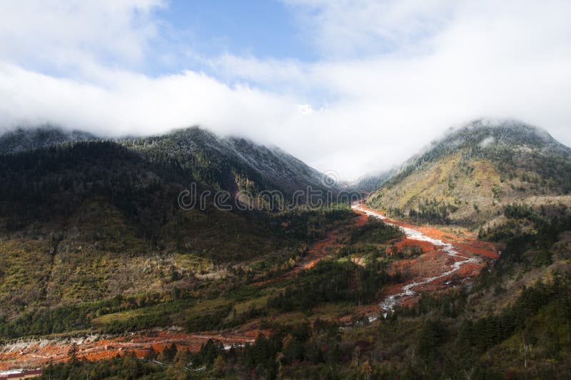 A Rock in a Stream in Front of a Small Reservoir. Stock Photo - Image ...