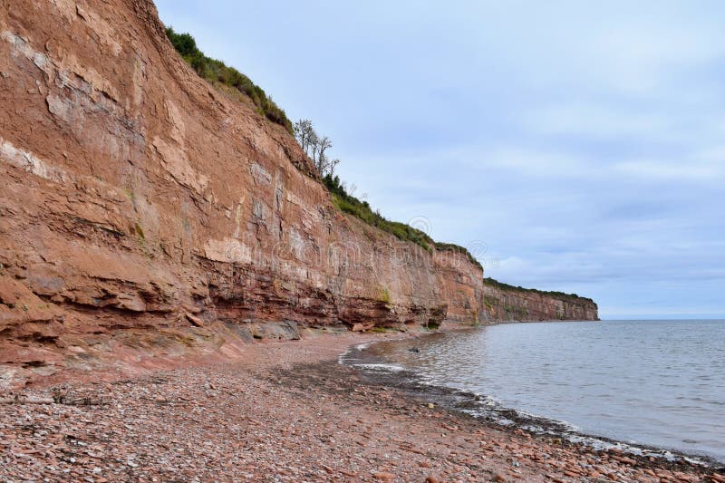 Red Rocks on a Beach Coast in Gaspesie, Quebec, Canada Stock Image ...