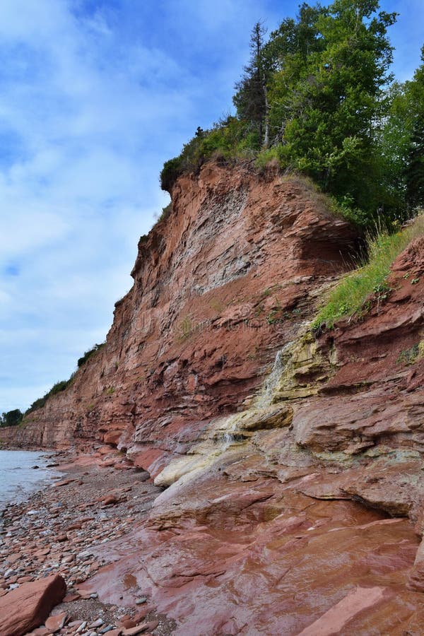 Red Rocks on a Beach Coast in Gaspesie, Quebec, Canada Stock Image ...