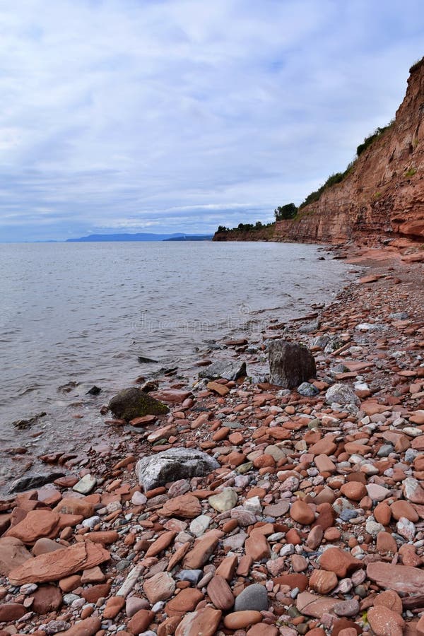 Red Rocks on a Beach Coast in Gaspesie, Quebec, Canada Stock Photo ...