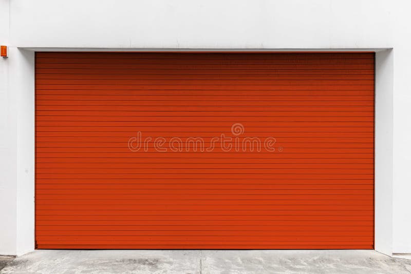 Red Roller Shutter Doors on the Ground Floor of the House Stock Image ...