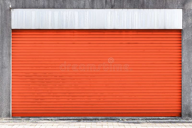 Red Roller Shutter Doors on the Ground Floor of the House Stock Image ...