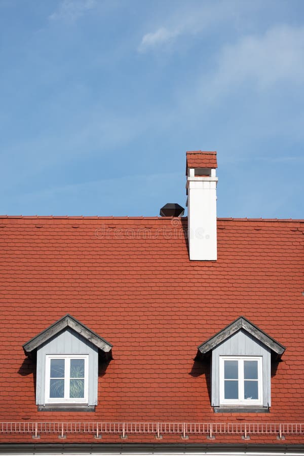Red Tile Roof and Gabled Dormer Windows on Building in Munich, Germany ...