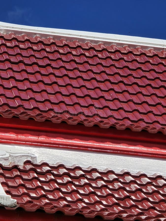 Red roof with metal tiles stock image. Image of tiles - 348037081