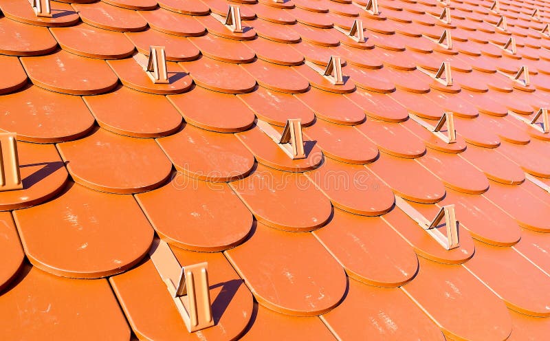 Red roof with snow guards stock image. Image of roofing - 41638723