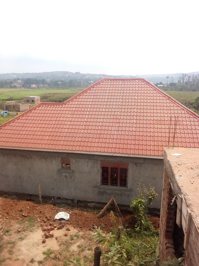 Red roof top in Uganda stock image. Image of uganda - 257702215