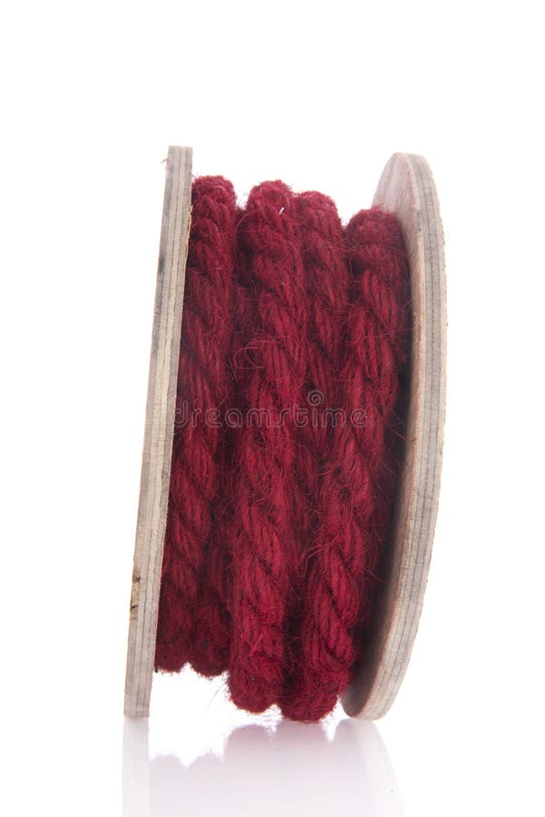 Red rope on wooden roll stock photo. Image of nature - 238007840