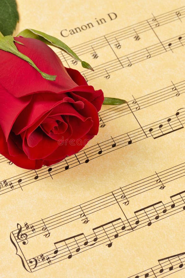 Red Rose Bud on Sheet Music Stock Photo - Image of paper, fashioned ...