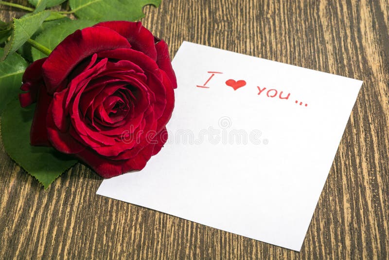 Red rose and love note stock image. Image of flower, roses - 73897059