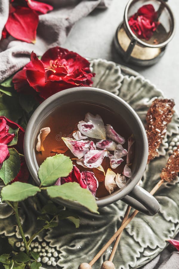 Red Rose Tea in Cup with Vintage Tea Utensils Stock Photo - Image of ...