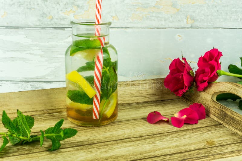 Red Roses with a Bio Lemonade Stock Photo - Image of juice, cool: 92351400