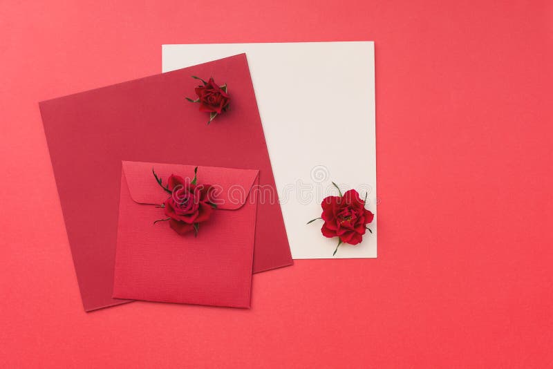 Red Roses with a Blank Greeting Card and Envelopes Stock Photo - Image ...