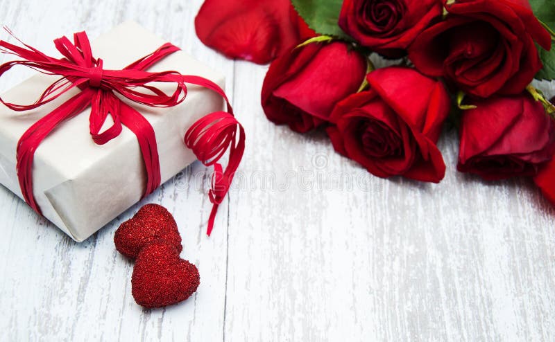 Red roses and gift box stock image. Image of celebration - 103668099