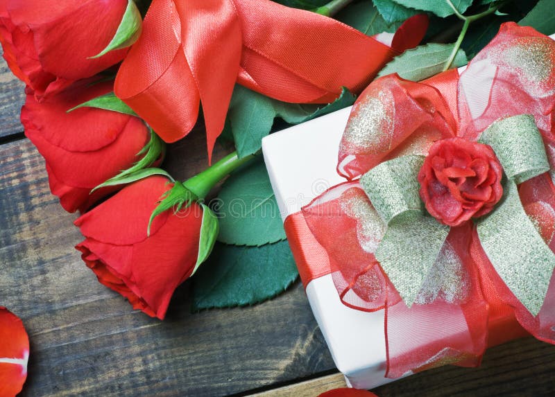 Red roses and holiday gift stock photo. Image of fresh - 28293336