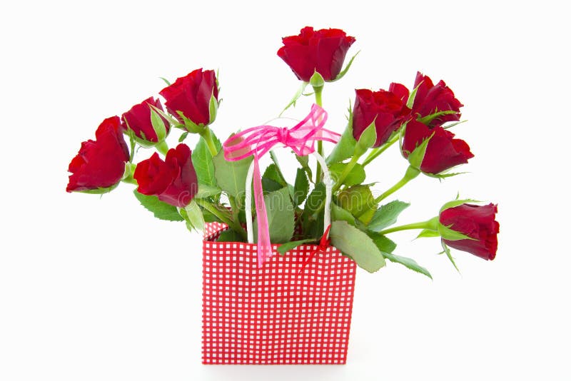 Red roses in paper bag stock photo. Image of romantic - 32625724