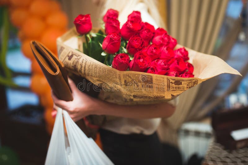 Red Roses in Paper stock image. Image of bouquet, paper - 81082351