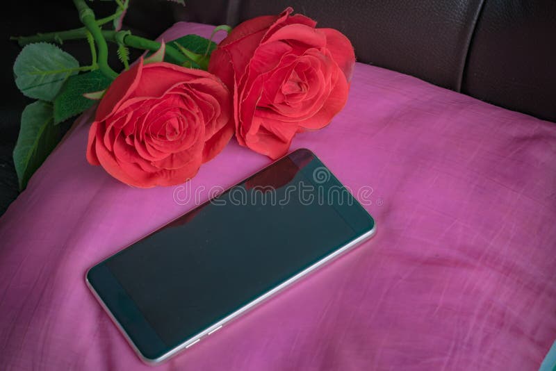 Red Roses and Phones stock image. Image of person, people - 108234449