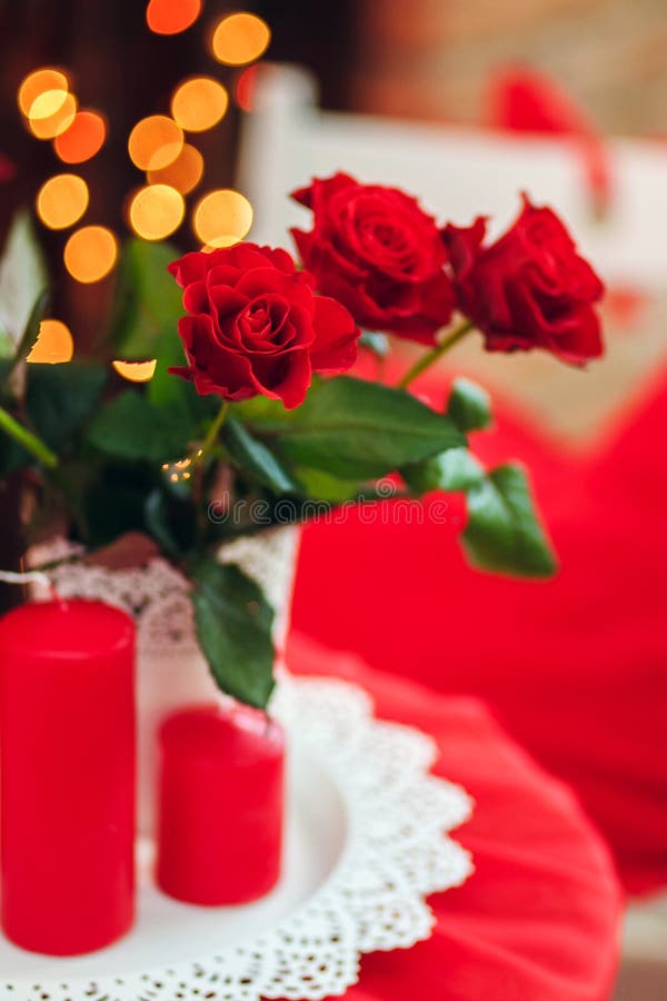 Red roses on the table stock photo. Image of flowers - 125205268