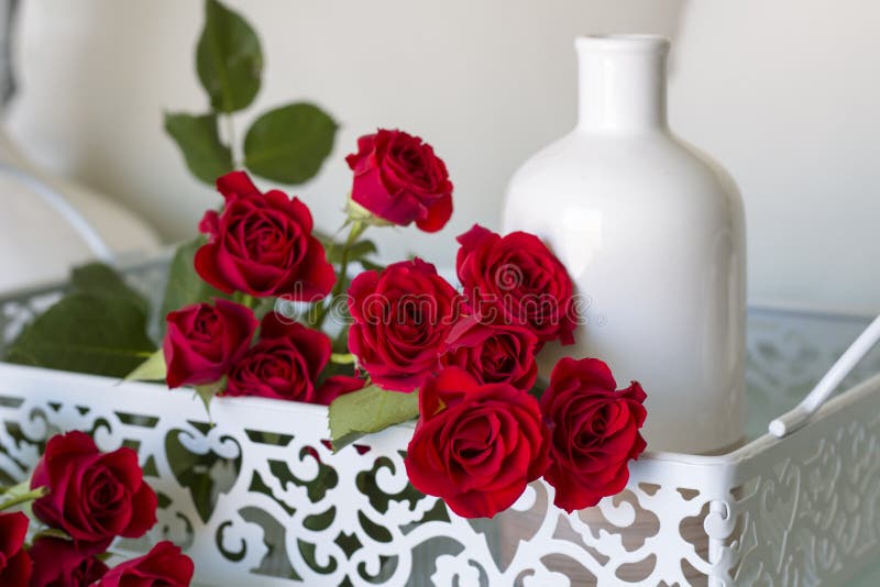 Red roses on table stock image. Image of birthday, blossom - 97901719