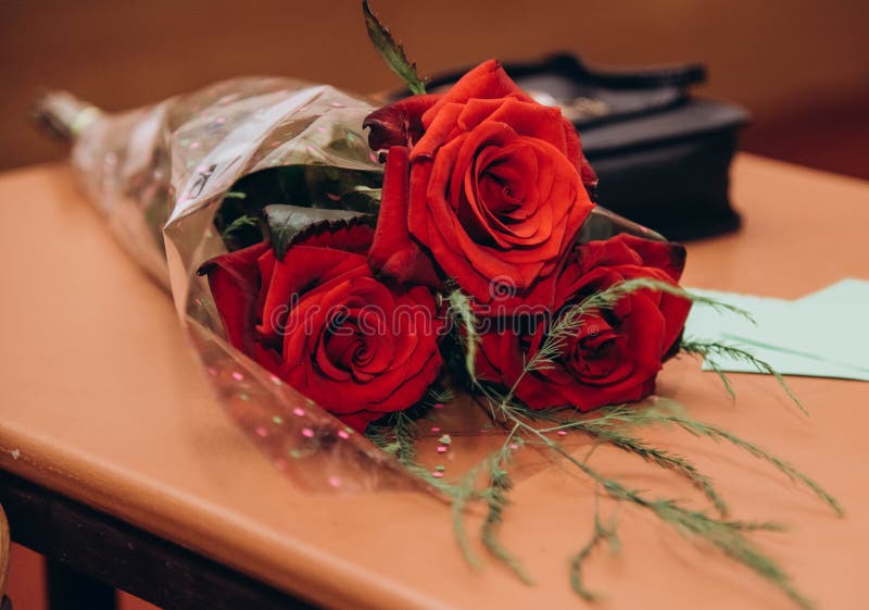 Red Roses. Three Red Roses are Collected in a Bouquet Stock Photo ...