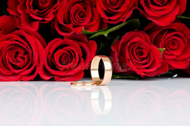 Red Roses and Wedding Rings Stock Photo - Image of petal, beauty: 12896432