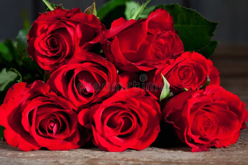 Red Roses on Wood, Close Up Stock Image - Image of bouquet, blossom ...