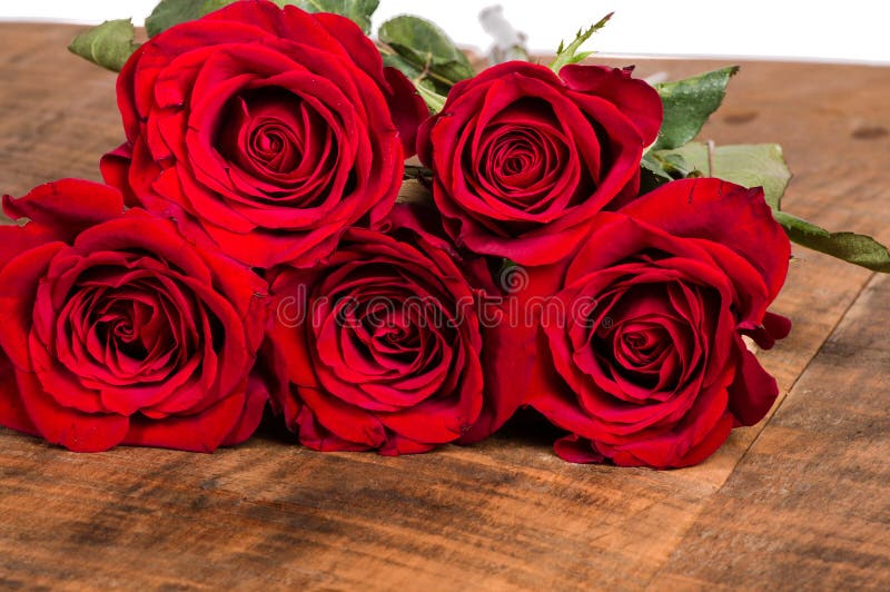 Red Roses on a Wooden Table Stock Image - Image of 14th, romance: 60313999