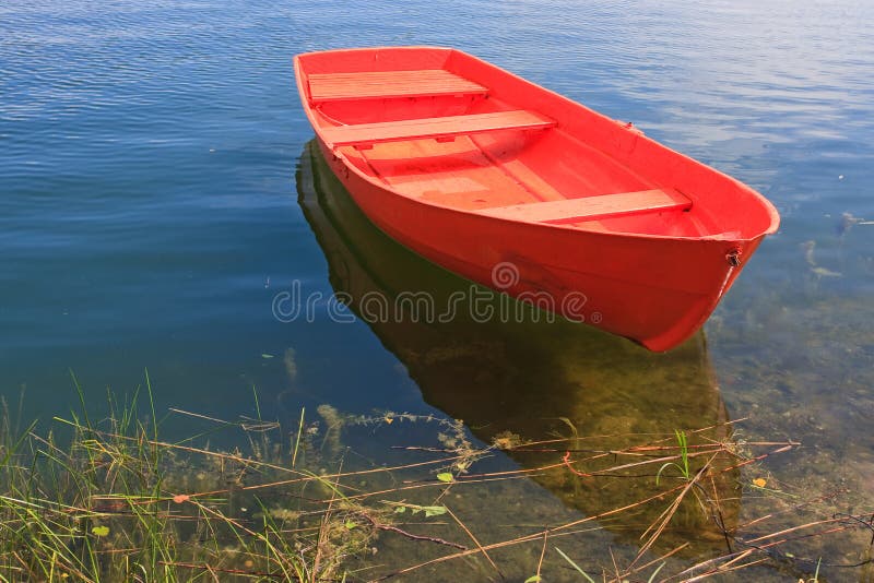 Red rowing boat stock image. Image of fishing, wood, vessel - 15573161