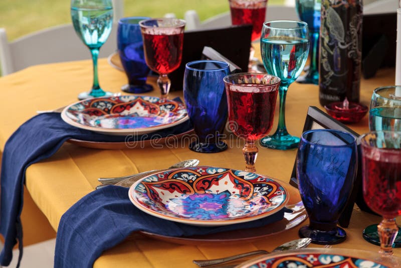 Red and Royal Blue Table Setting Stock Photo - Image of plates, dinner ...