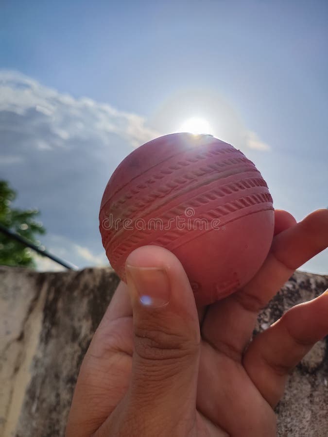 Red Rubber Ball Against the White Sun Stock Image - Image of white ...