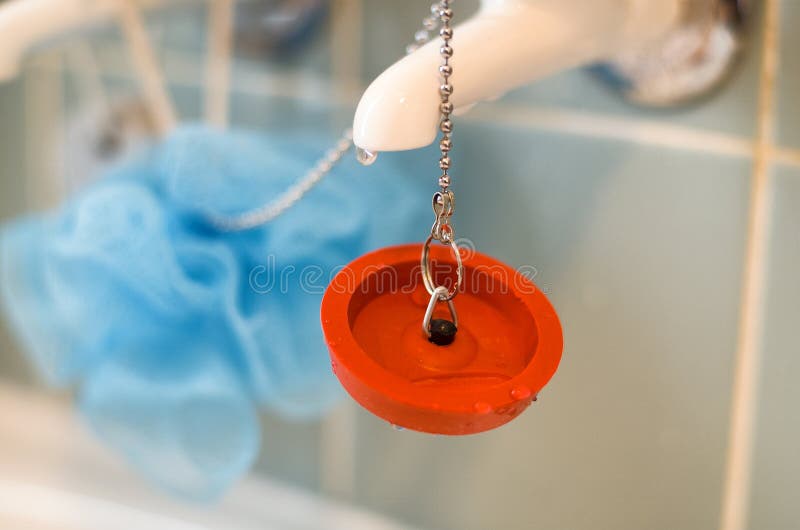Red Rubber Bath Plug on Chain Stock Photo - Image of sink, chain: 96433980