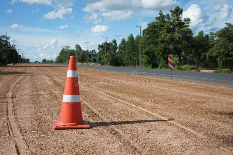 Red Rubber Cone is Placed on the Road during the Construction of the ...