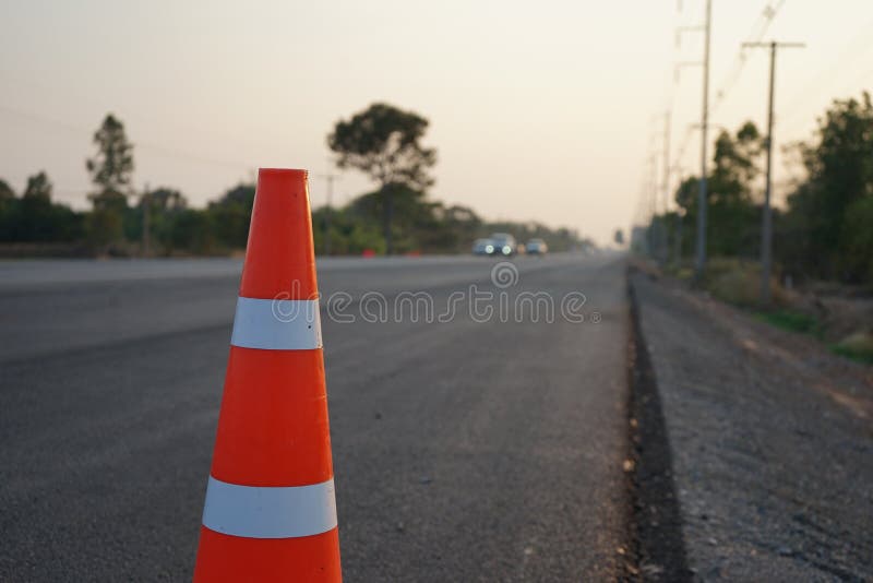 Red Rubber Cones are Placed in the Paved Road Stock Image - Image of ...