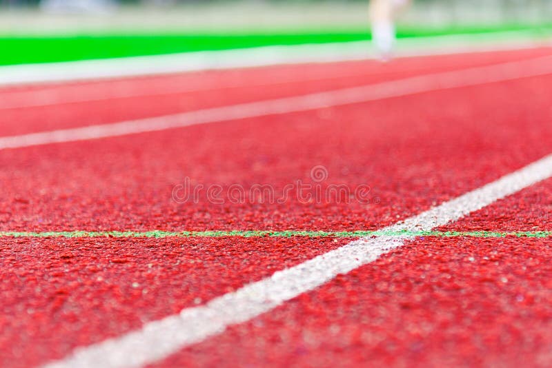 Red Rubber Running Red Track Texture Close Up. White Line in the Center ...