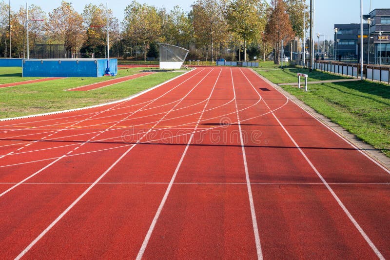 Red Running Lane on Outdoor School Stadium Stock Photo - Image of arena ...
