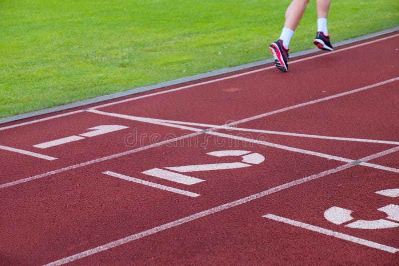Red Running Racetrack on the Athletic Stadium Stock Image - Image of ...