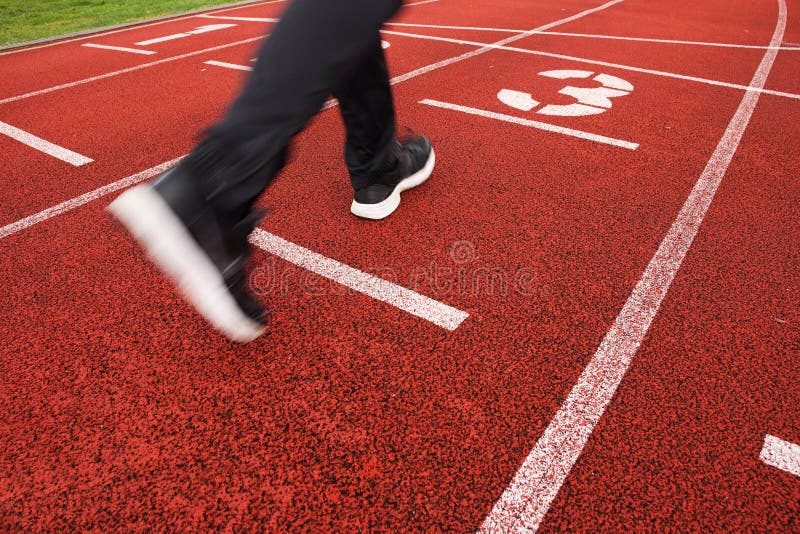 Red Running Racetrack on the Stadium with Run Legs Stock Image - Image ...