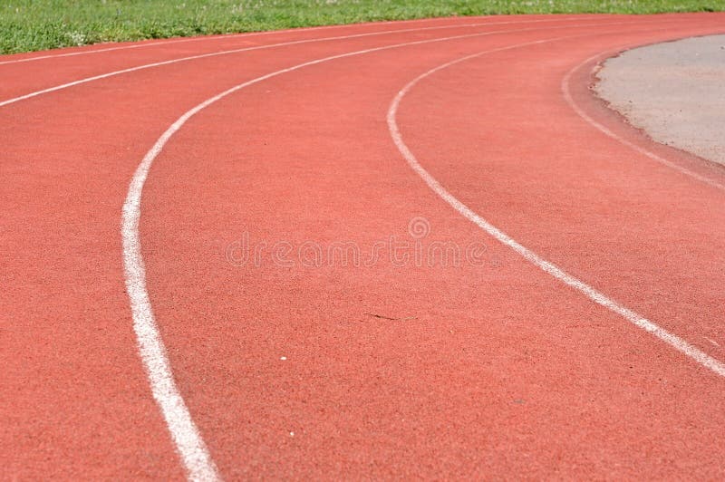 Red running track stock image. Image of ground, field - 26408083
