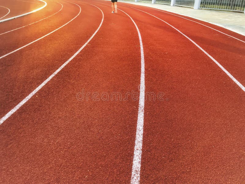 Red running track stock image. Image of competition - 164523799